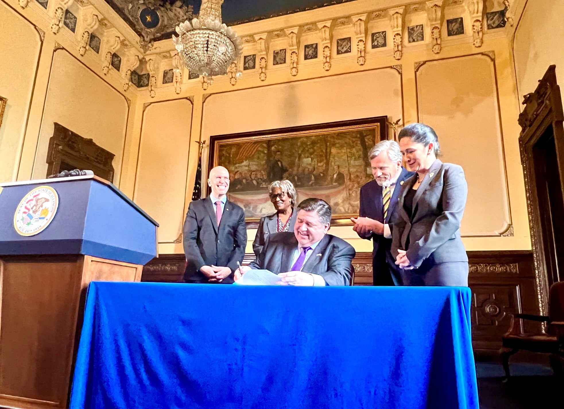 Sen. Martwick addresses pensions at bill signing. - Senator Robert Martwick